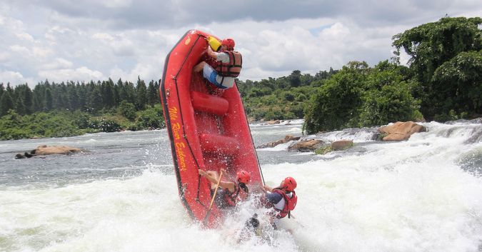 Maneuvering_water_rapids_during_white_water_rafting_on_River_Nile.-001 ...